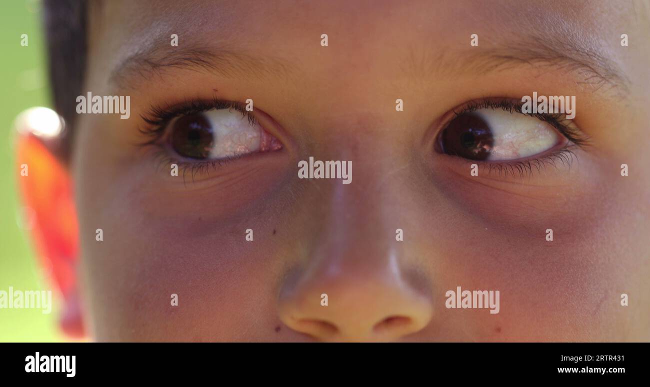 Child eyes looking sideways right and left feeling anxious. Worried ...