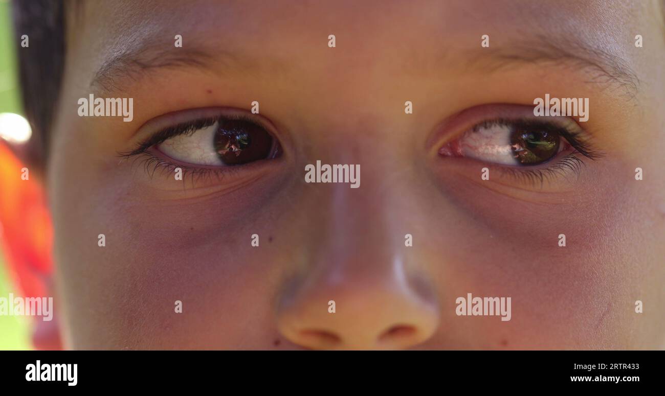 Child eyes looking sideways right and left feeling anxious. Worried ...
