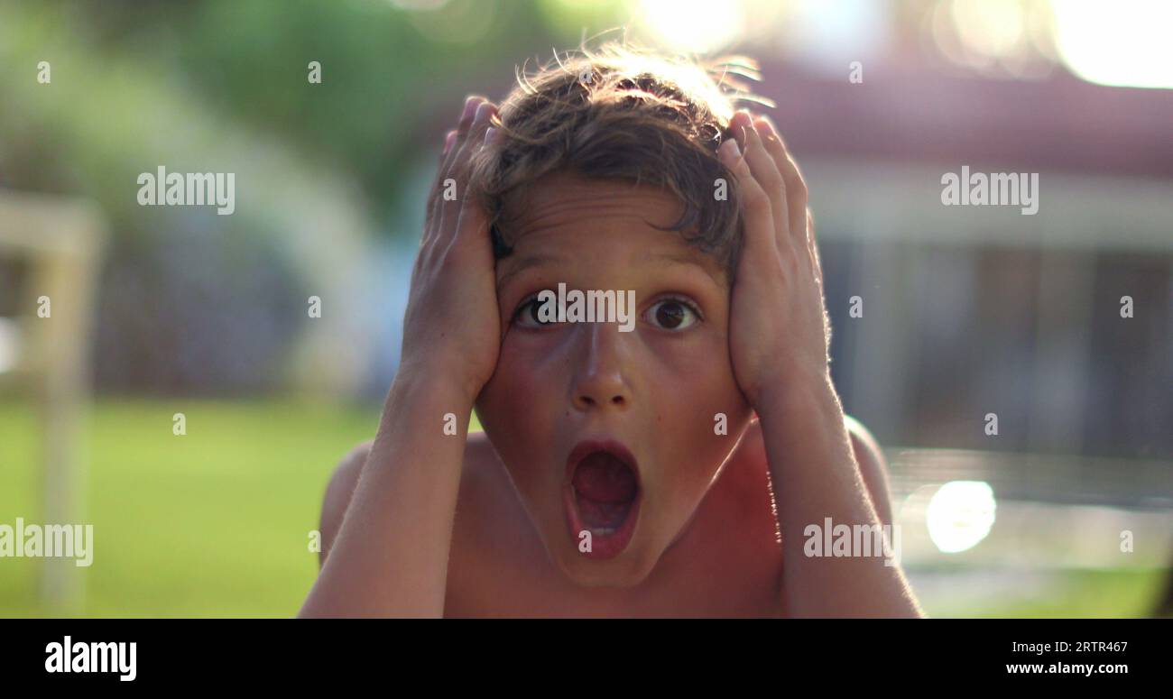 Child boy SHOCK reaction with despair. Emotional kid reacting with ...