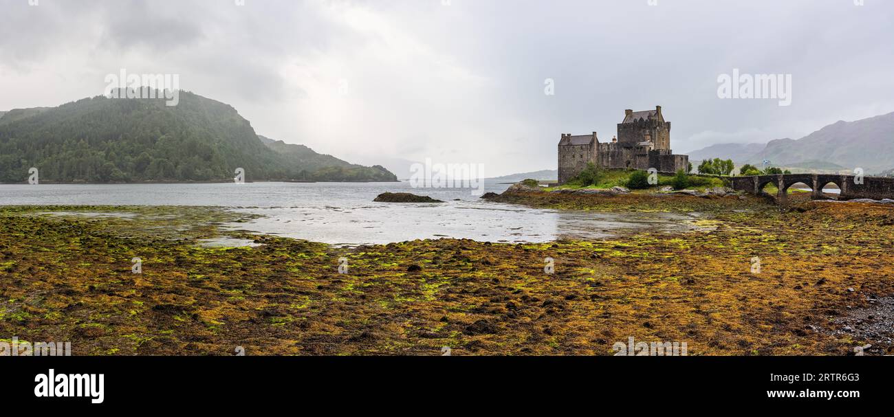 Early morning sunlight over Eilean Donan Castle at Kyle of Lochalsh in ...