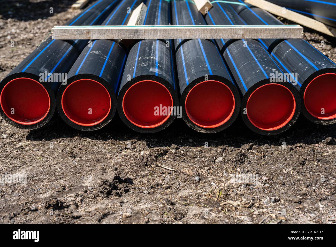 Six large water pipes in a stack Stock Photo - Alamy