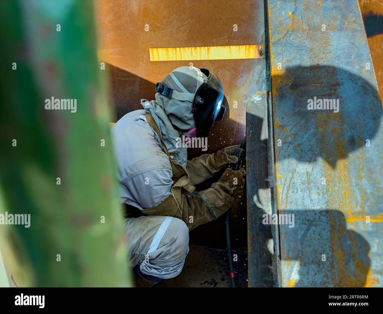 Welder working with an electrode. Welding work Stock Photo - Alamy