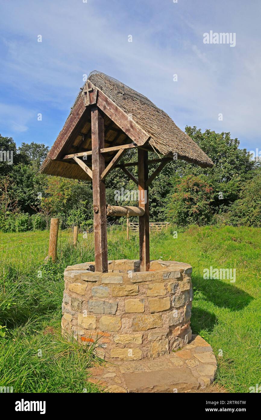Thatched stone well at Mediaeval village at Cosmeston Lakes and Country ...