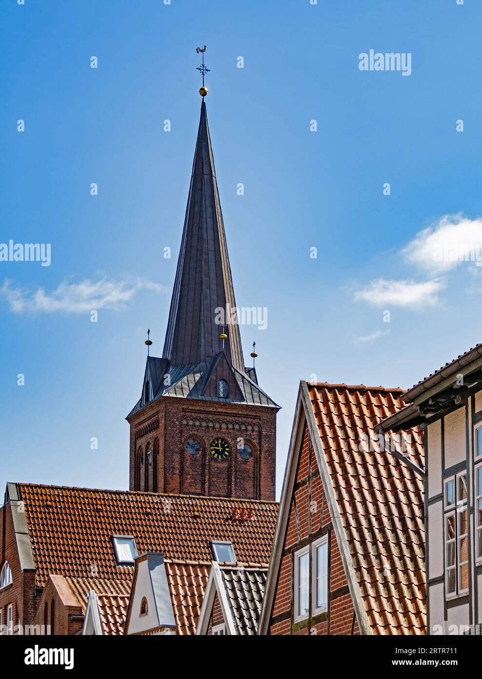 Historic houses and St. Nicholas church in the old town of Ploen ...