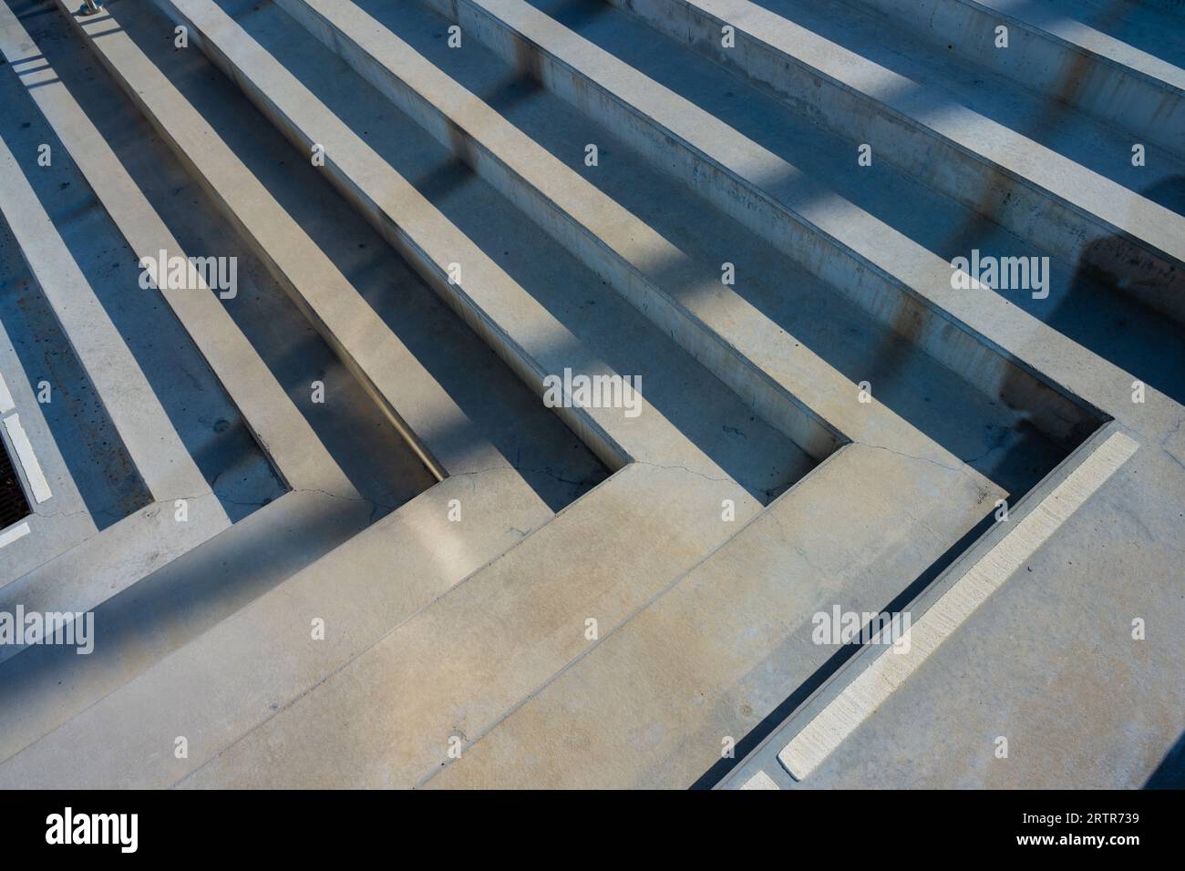 Concrete corner stairs in an angle Stock Photo - Alamy