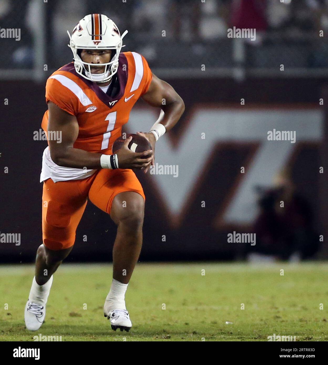 Virginia Tech quarterback Kyron Drones (1) runs the ball for a first down during the final Tech ...