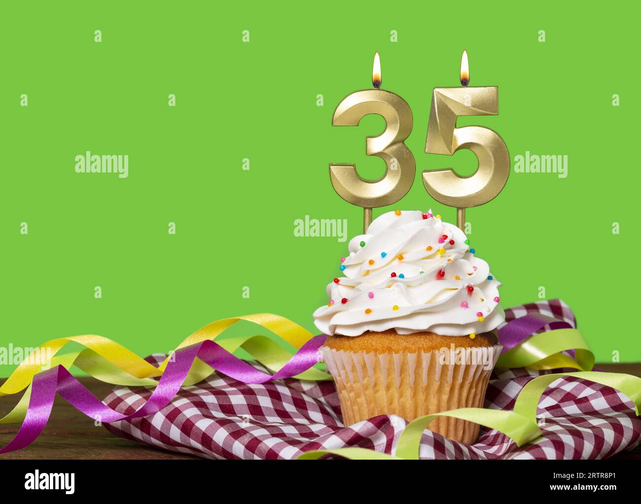 Birthday Cake With Candle Number 35 - On Green Background Stock Photo ...