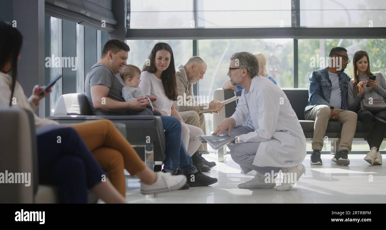 Diverse patient hospital waiting room hi-res stock photography and ...