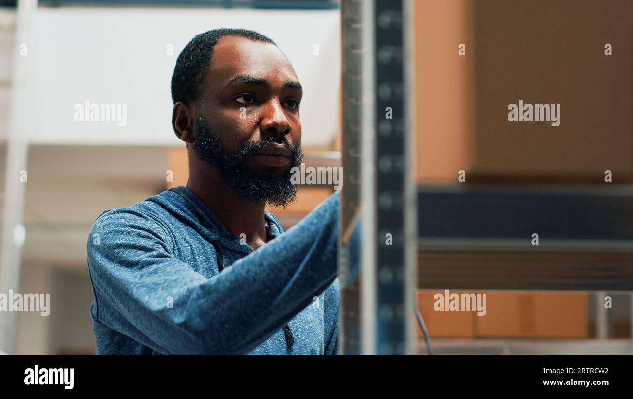 African american worker planning products hi-res stock photography and ...