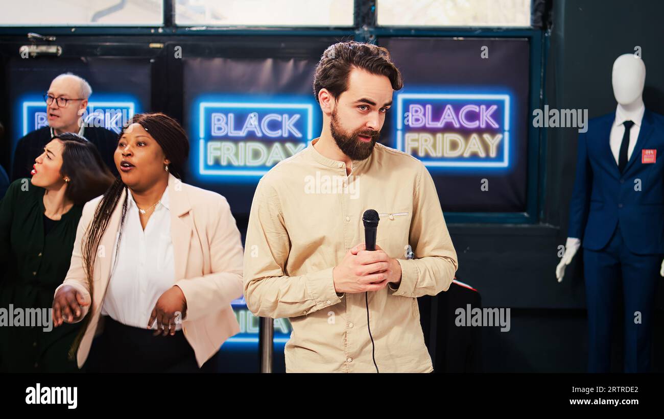 TV reporter standing in front of camera reporting breaking news from ...