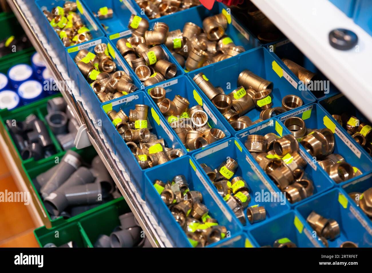 Plumbing pipe corners in shop Stock Photo - Alamy