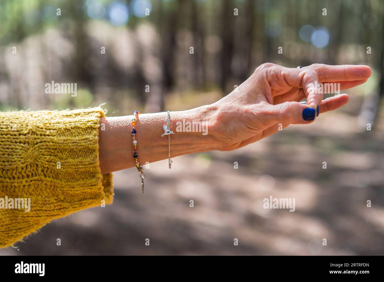 Chin mudra close up over nature background Stock Photo - Alamy