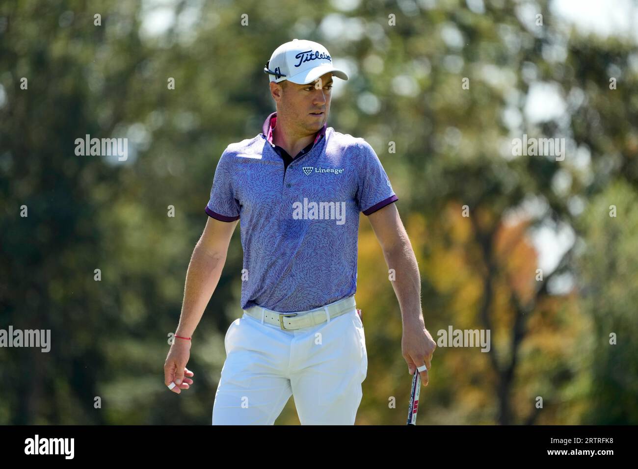 Justin Thomas follows his putt on the third green of the Silverado ...