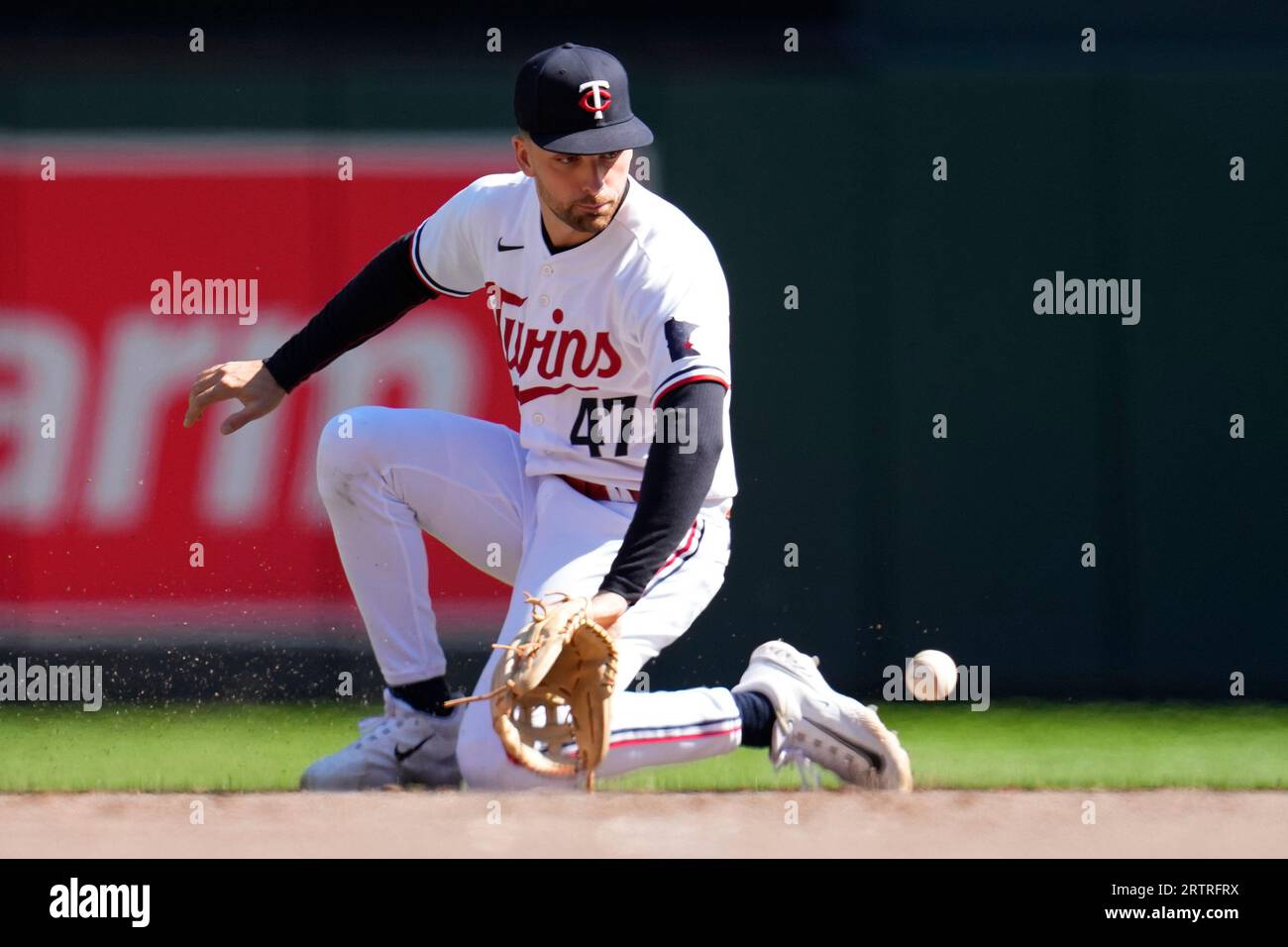 Minnesota Twins second baseman Edouard Julien (47) fields the ball to ...