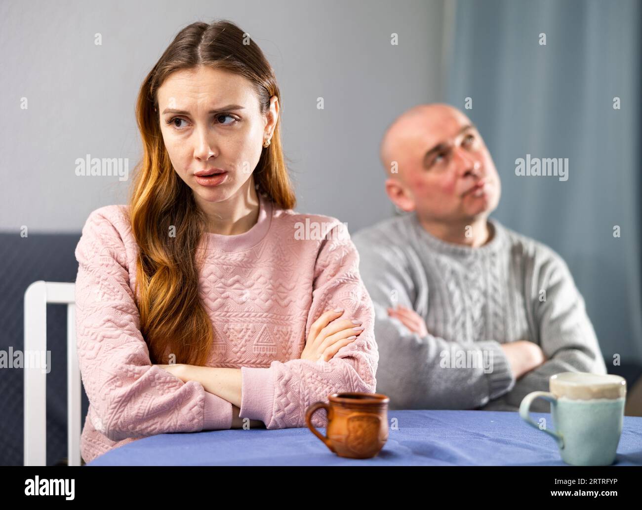 Portrait of a married couple offended at each other Stock Photo - Alamy
