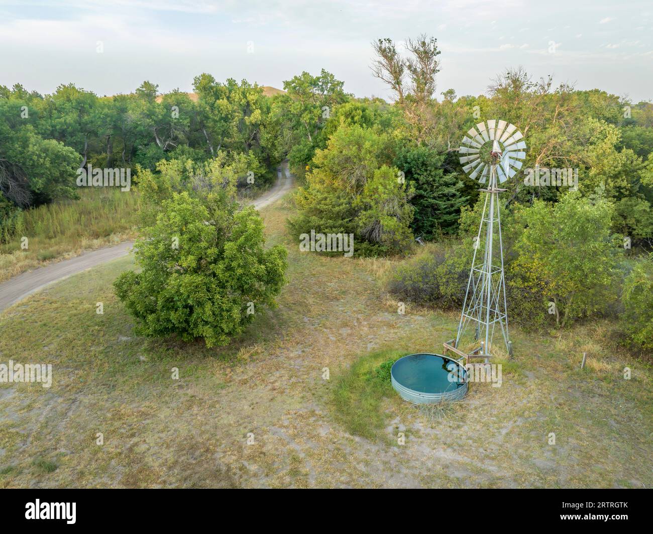 windmill with a water tank in Nebraska Sandhills - Whitetail Campground ...