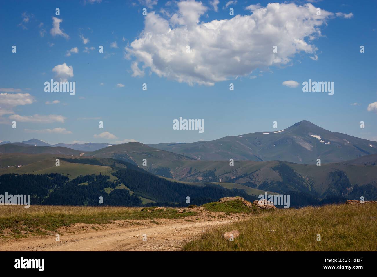 high mountain summit view with clouds on sunny day. Rural life in ...