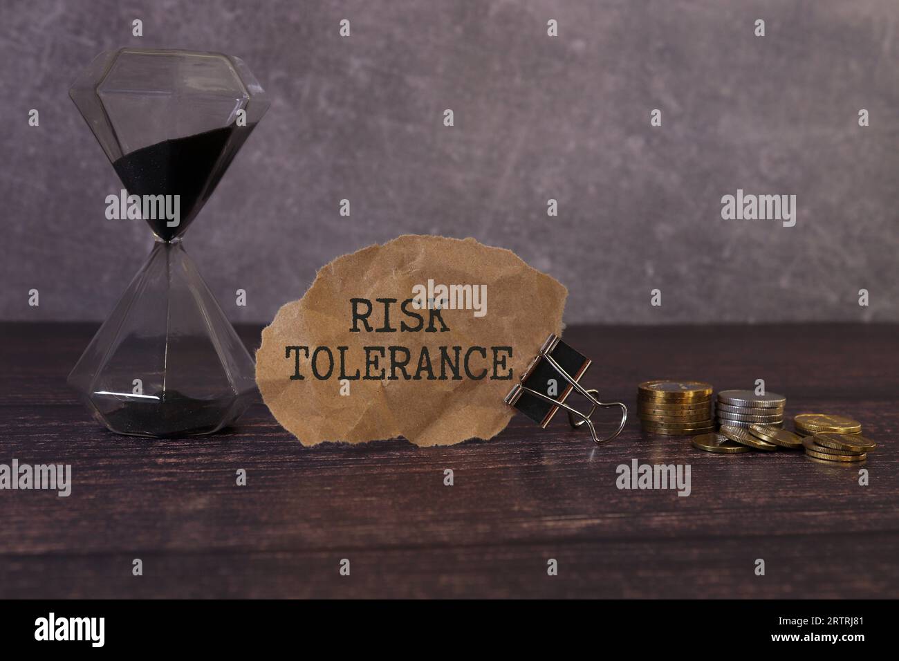 RISK TOLERANCE on torn paper Stock Photo - Alamy