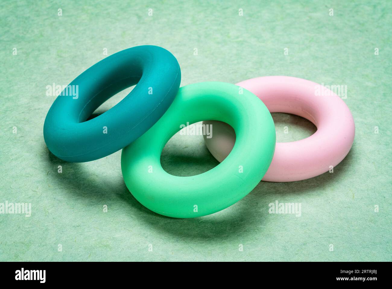 set of rubber rings - hand grip strength trainers Stock Photo - Alamy