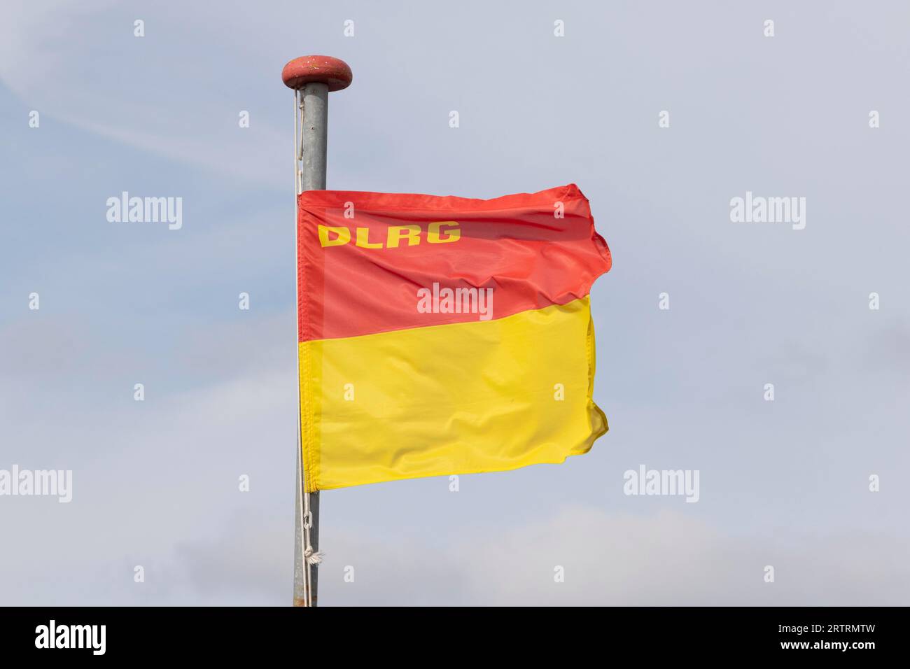 Symbolic image, sea rescue, lifeguard, waving flag of the DLRG, North ...