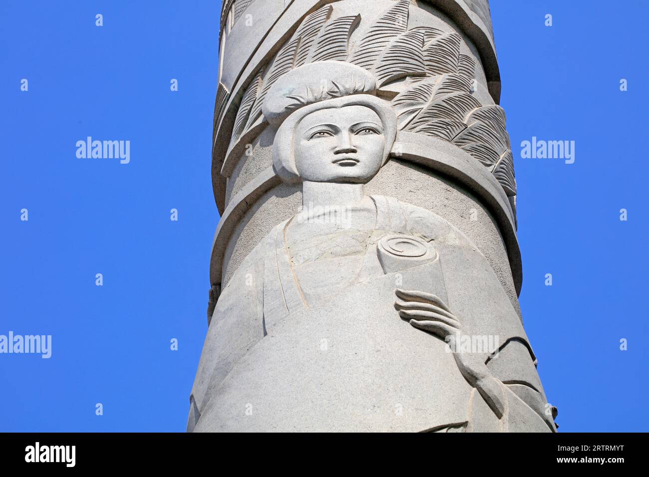 ancient Chinese characters carved on the totem pole Stock Photo - Alamy