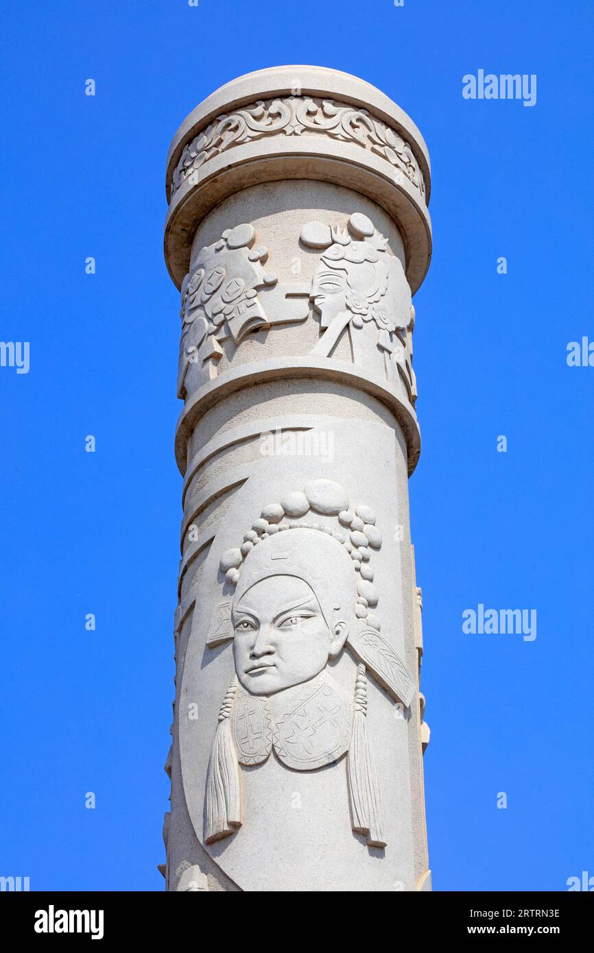 ancient Chinese characters carved on the totem pole Stock Photo - Alamy