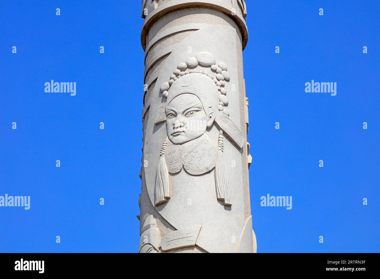 ancient Chinese characters carved on the totem pole Stock Photo - Alamy