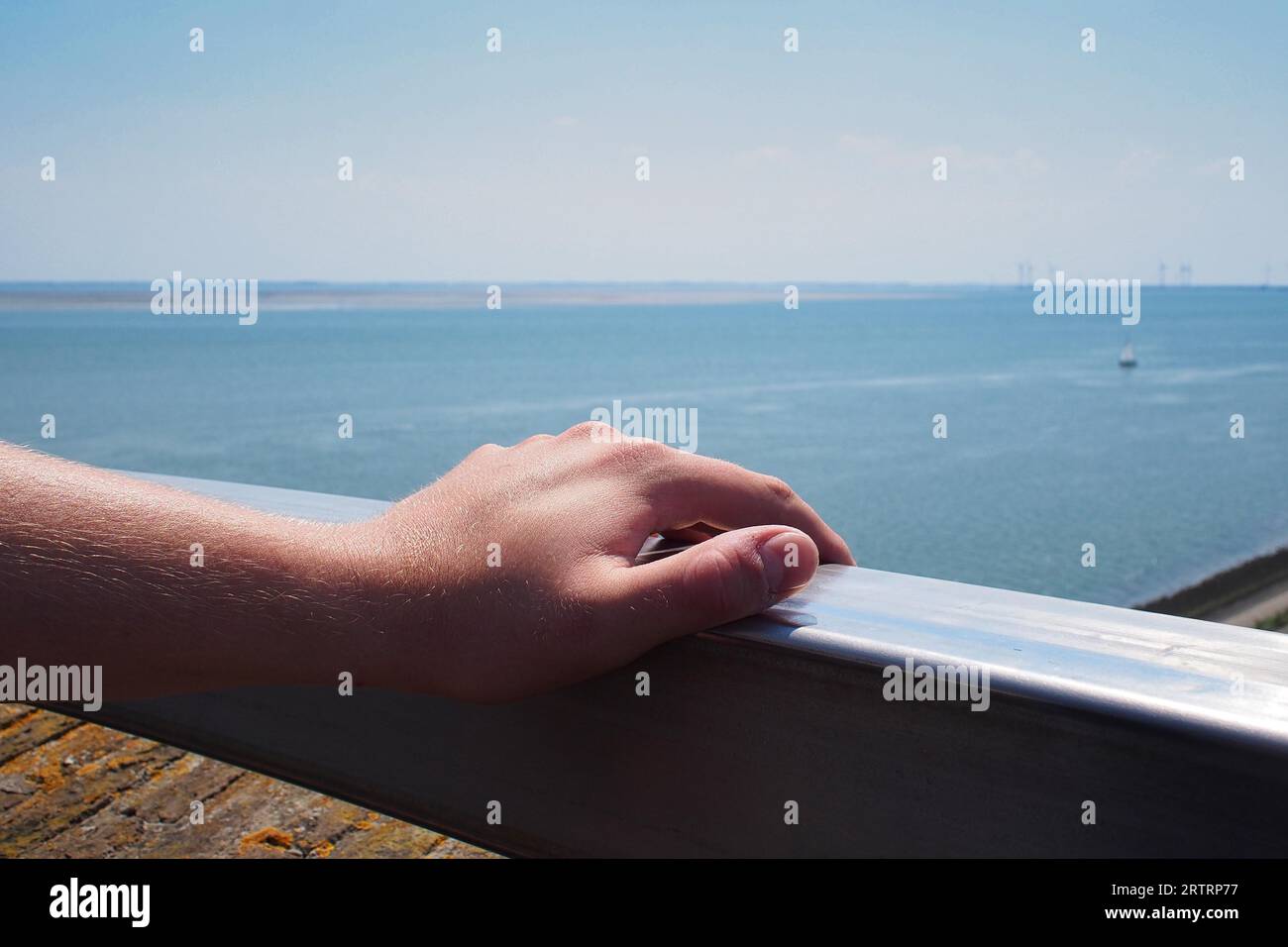 Male hand sea hi-res stock photography and images - Alamy