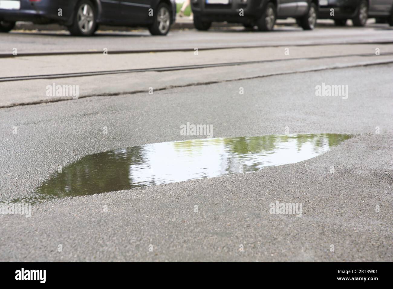Puddle water near road in hi-res stock photography and images - Alamy