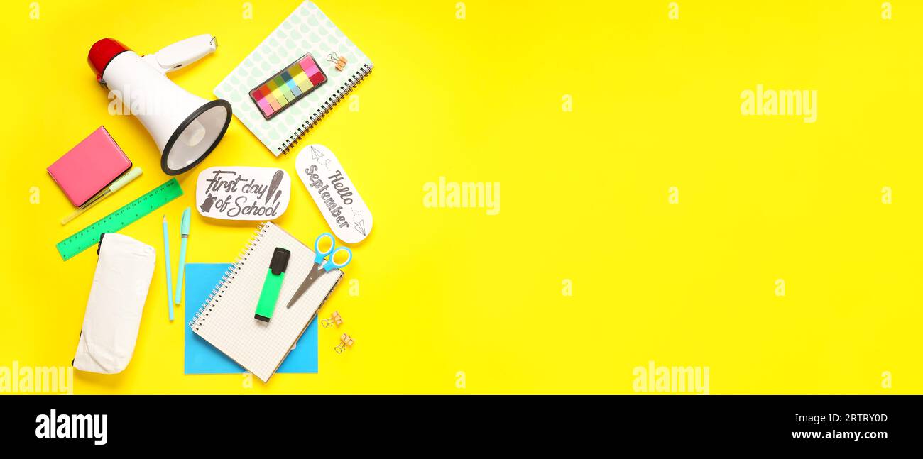 Stationery, megaphone, paper sheets with text HELLO SEPTEMBER and FIRST ...