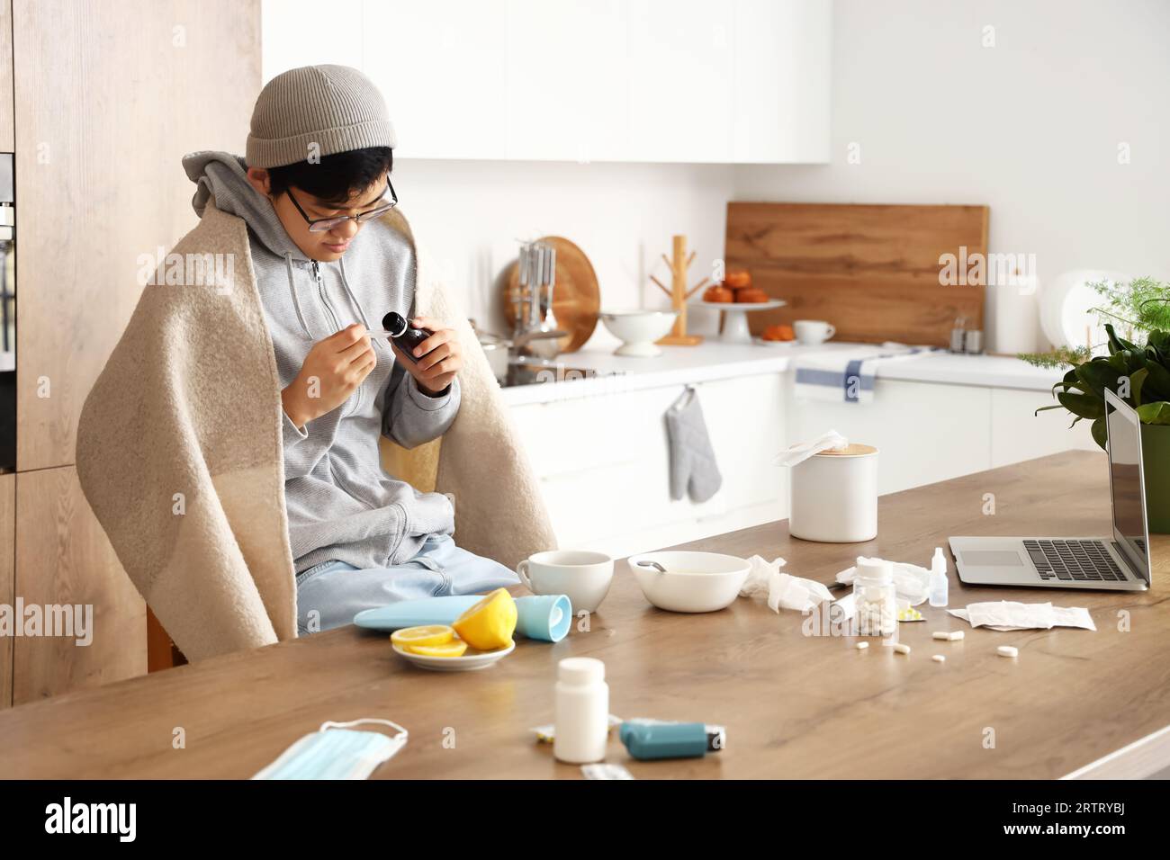 Man taking cough syrup hi-res stock photography and images - Alamy