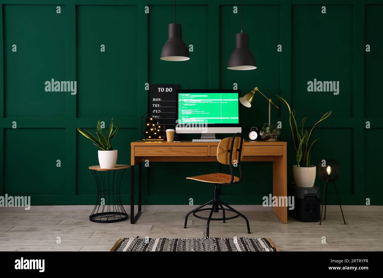 Interior of office with programmer's workplace and houseplants Stock ...