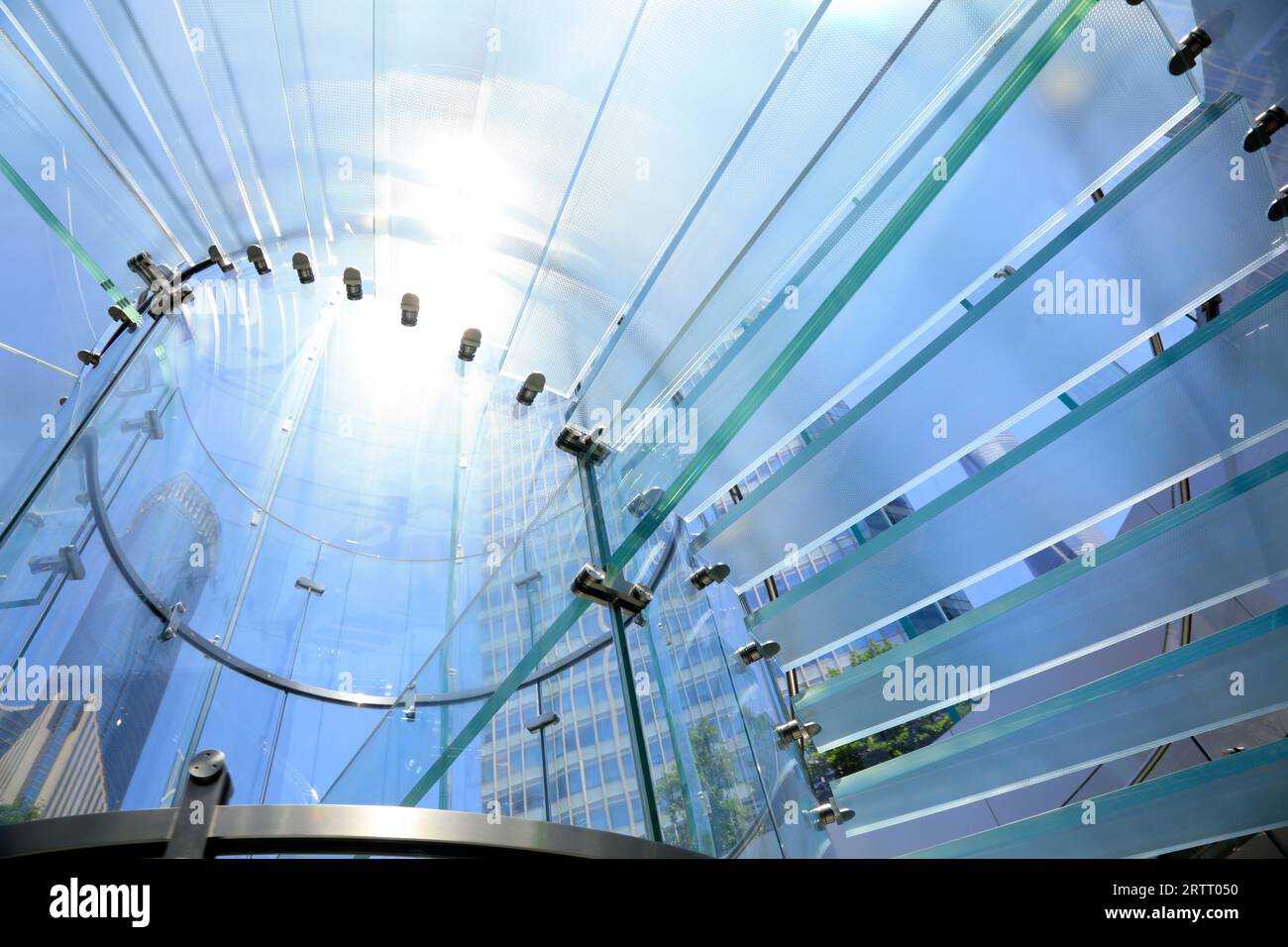 Glass spiral staircase in a store, Shanghai, China Stock Photo - Alamy