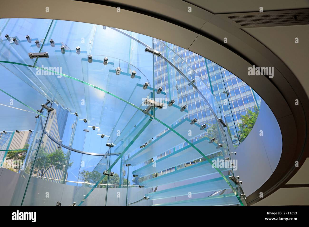 Glass spiral staircase in a store, Shanghai, China Stock Photo - Alamy
