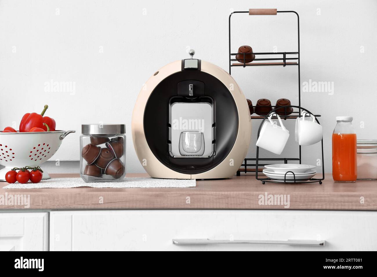 Modern coffee machine on countertop in kitchen Stock Photo - Alamy