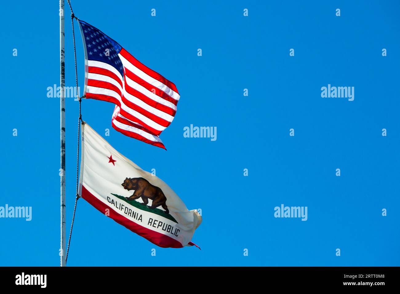 Twin Peaks, USA, 16th August, 2015: The USA and California state flags ...