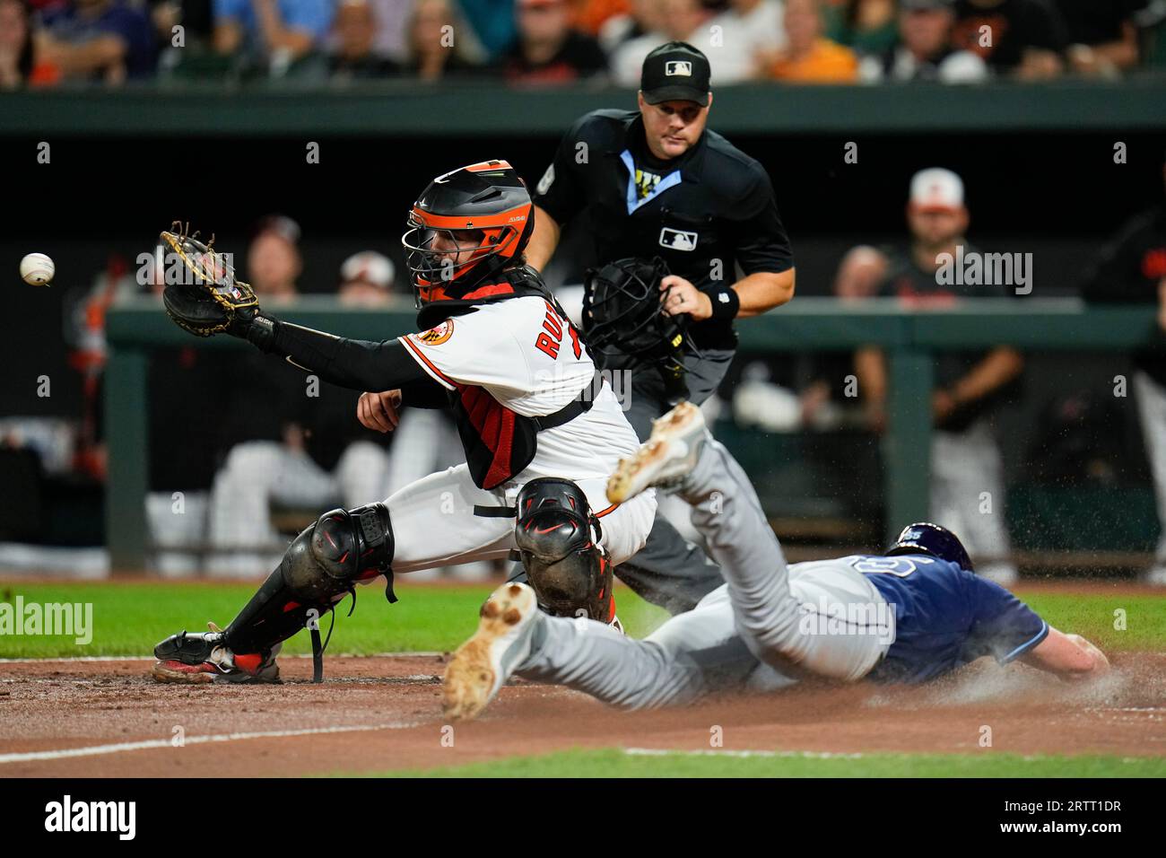 Tampa Bay Rays' Luke Raley, right, slides in ahead of the throw as ...