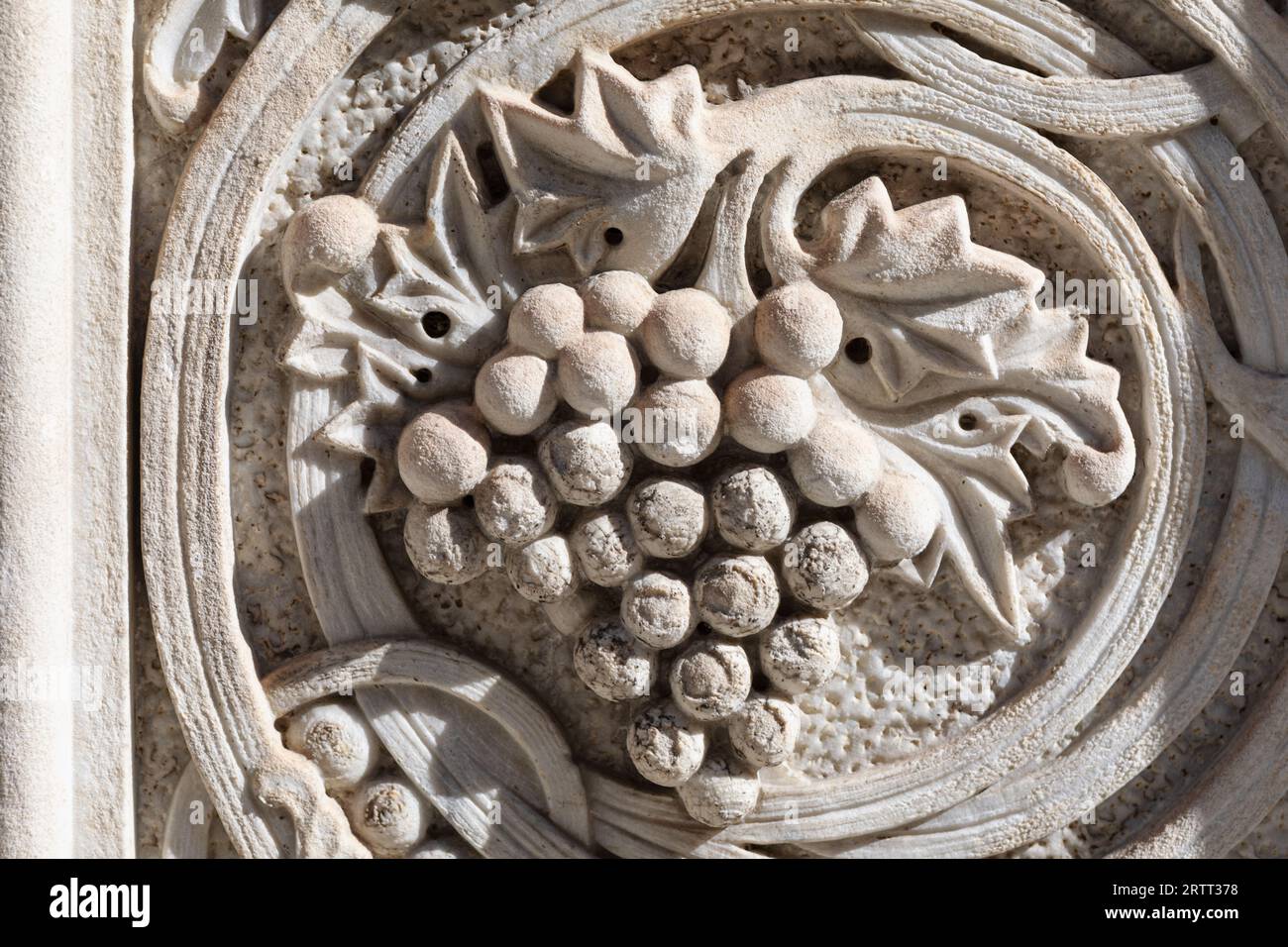 Grape carved in white stone , close up details Stock Photo - Alamy