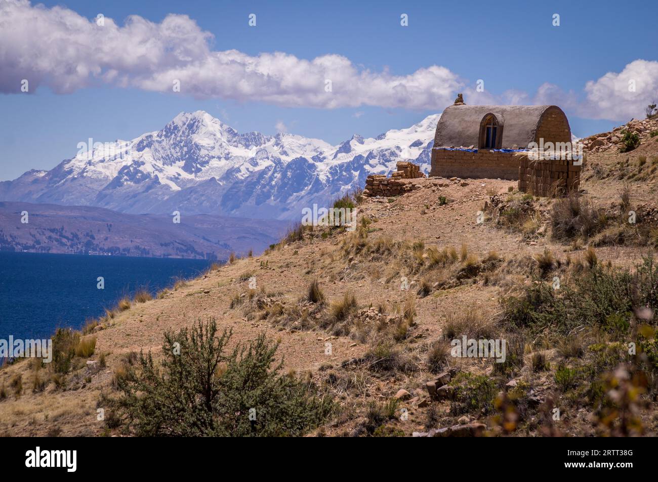 Inca ruins with Andean mountains at Island of the moon, Lake Titicaca ...