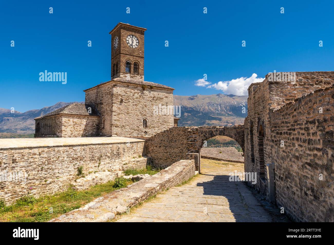 The clock tower in the Ottoman castle fortress of Gjirokaster or ...