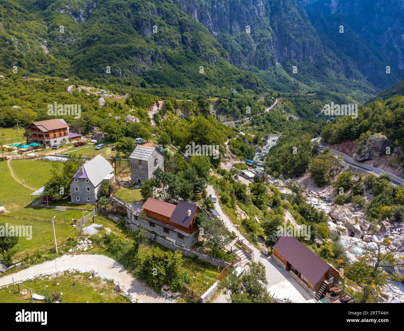 Aerial view over Nikoll Koceku tower in the valley of Theth national ...