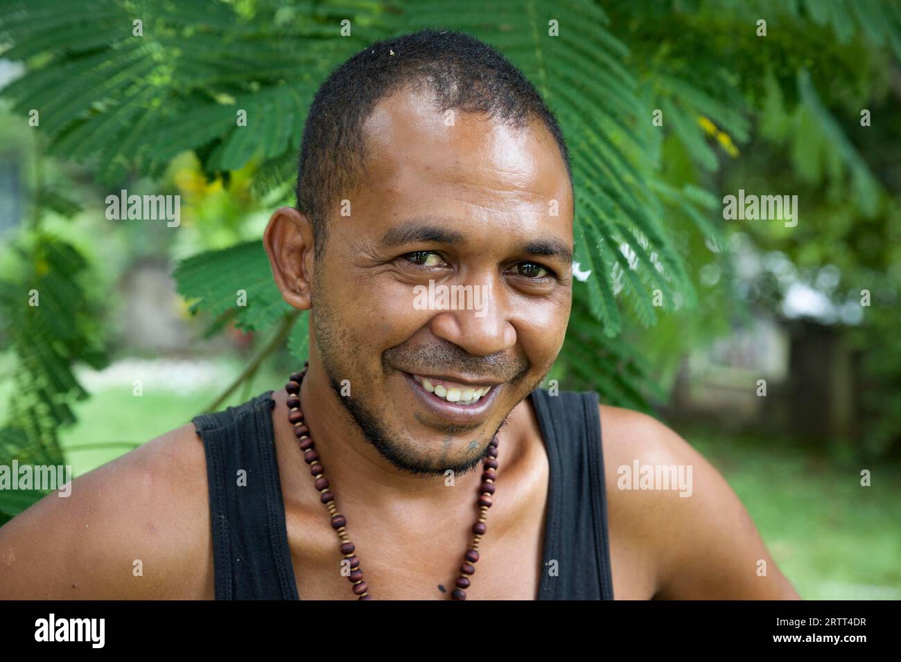 Local man, laughing, portrait, Flores, Indonesia Stock Photo - Alamy