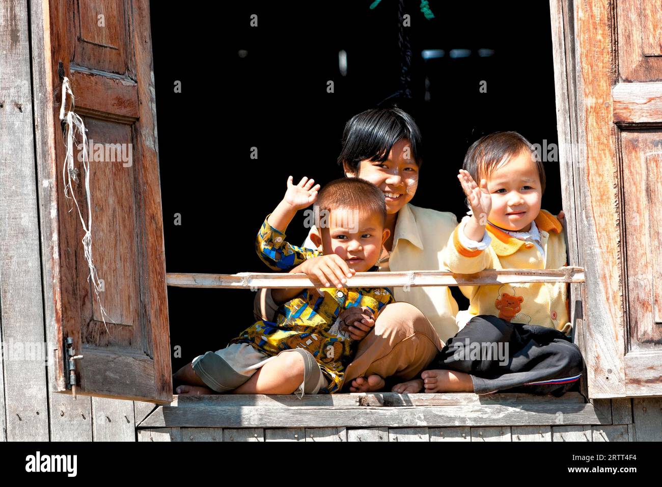 Children waving at an open window, Inle Lake, Myanmar Stock Photo - Alamy