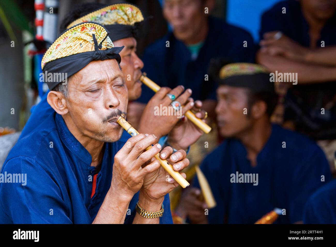 Flute player at funeral service, Bali, Indonesia Stock Photo - Alamy