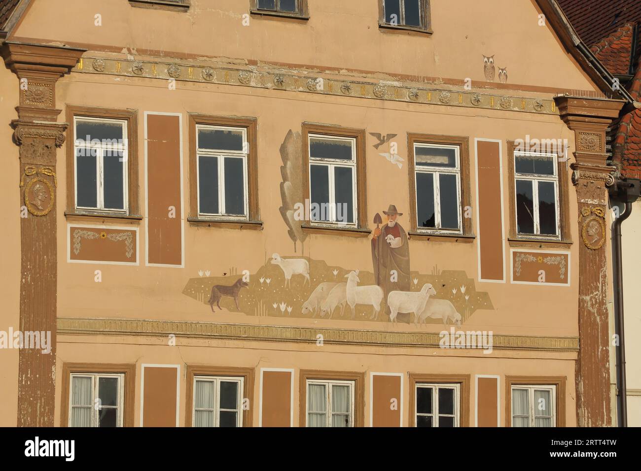 Mural with shepherd and flock of sheep on historical building with ...