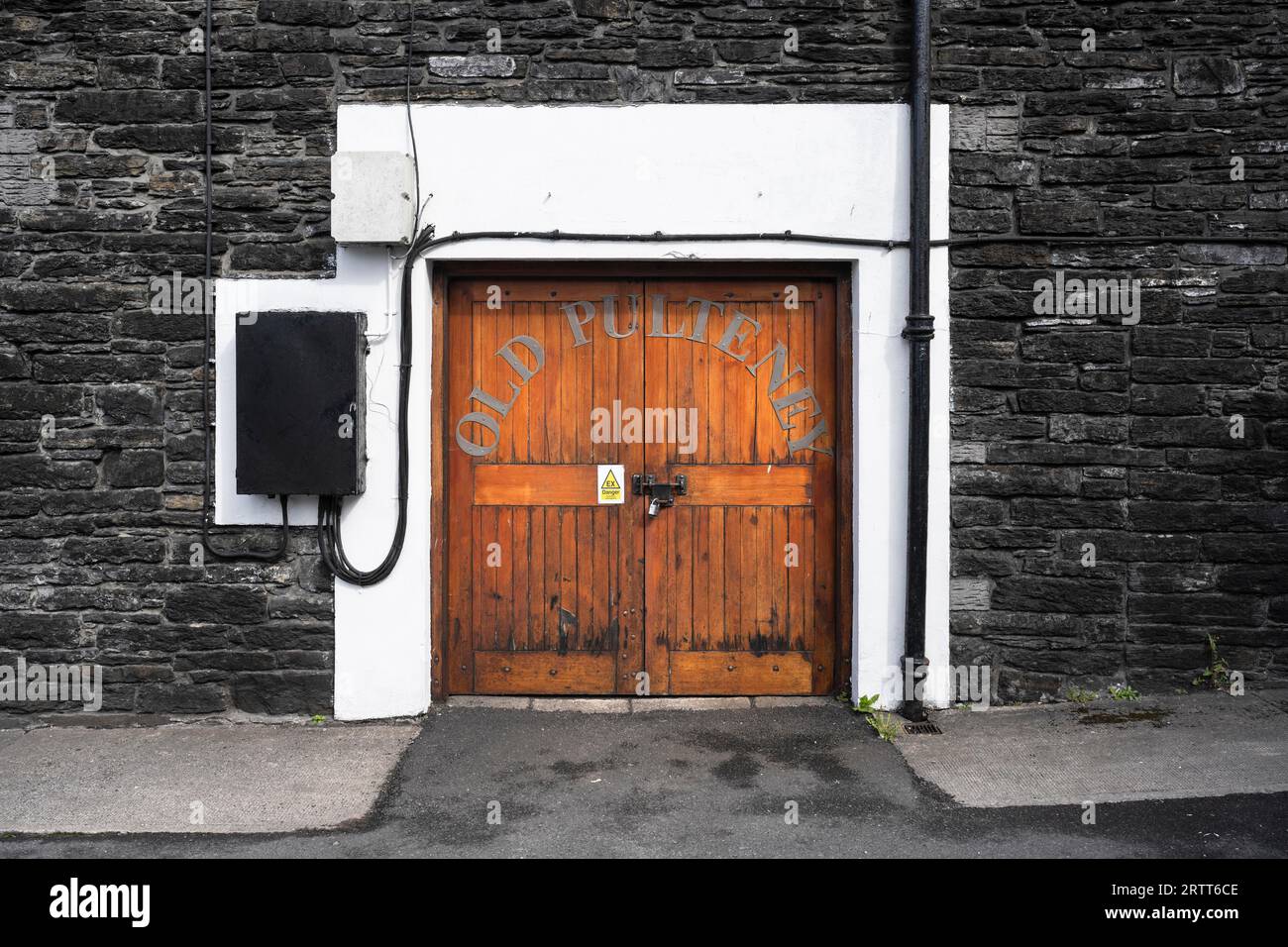 Wooden door to the warehouse of the Old Pulteney whisky distillery in ...
