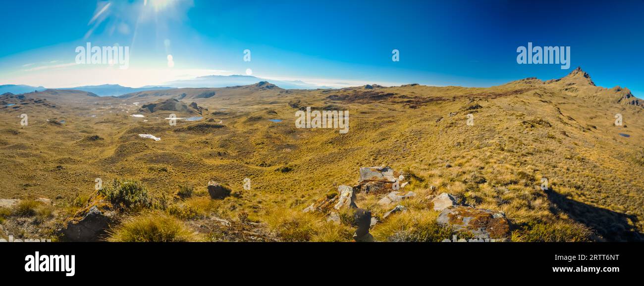 Panoramic photo of lonely fields on sunny day near Mt. Giluwe in Papua ...