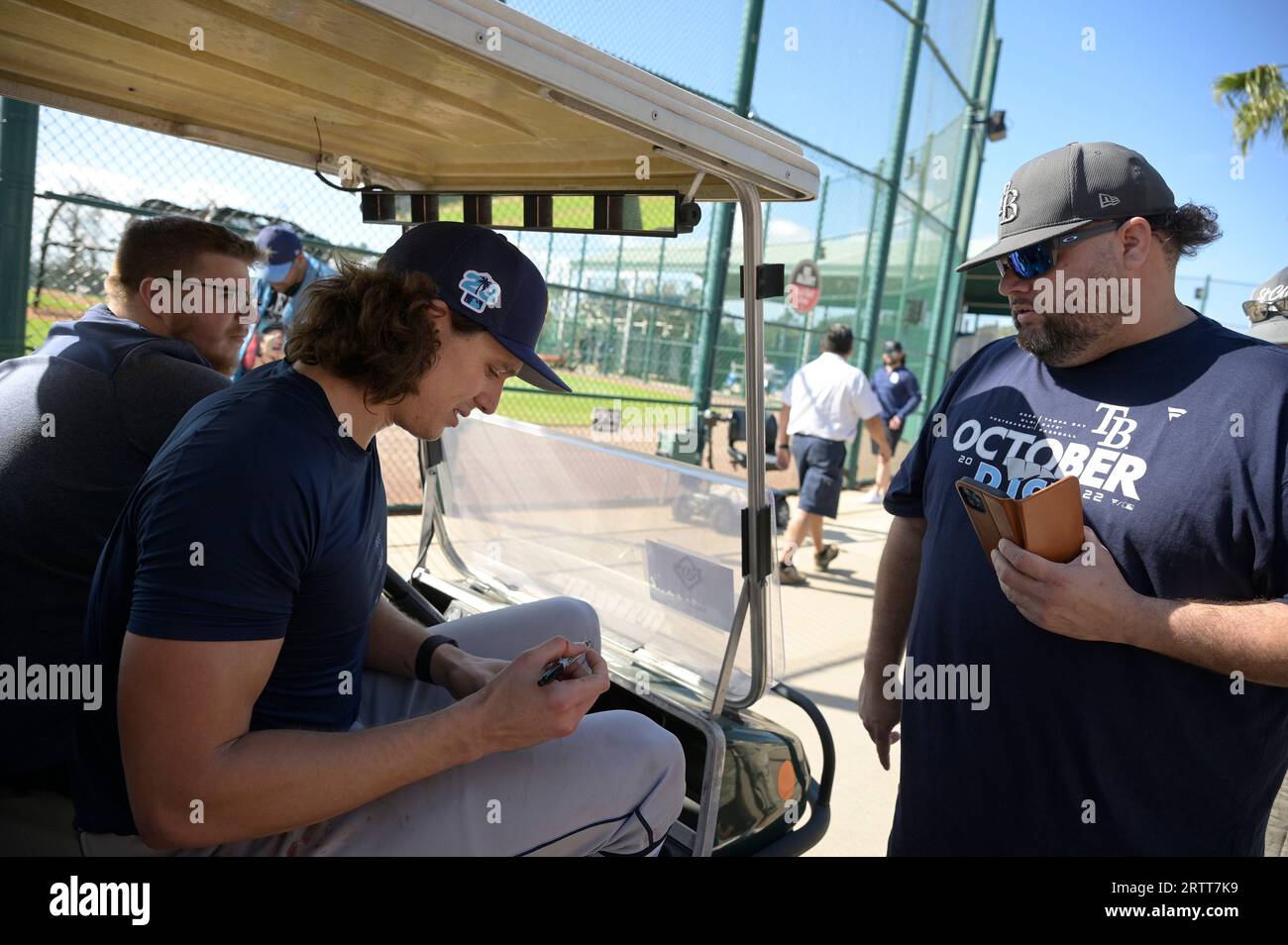 Tampa Bay Rays pitcher Tyler Glasnow, left front, signs autographs for ...
