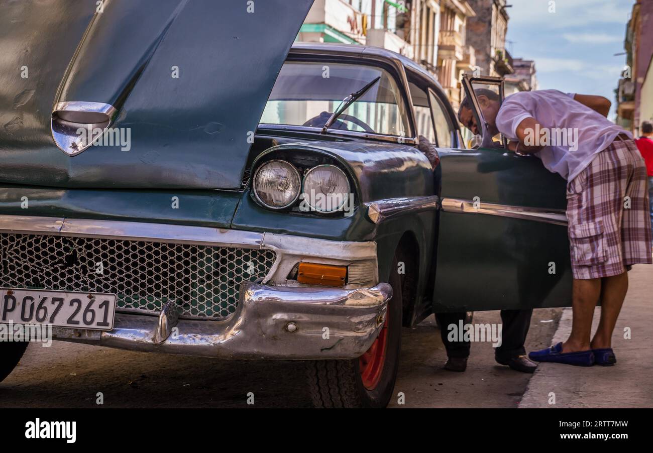 Havana, Cuba on December 23, 2015: Cuban mechanic trying to fix an ...