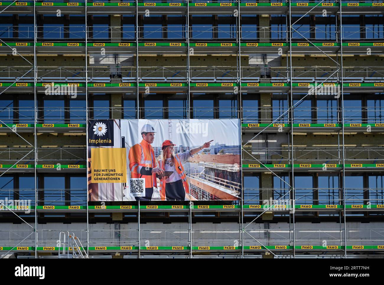 Construction site Scaffolding Implenia Advertising Stock Photo - Alamy